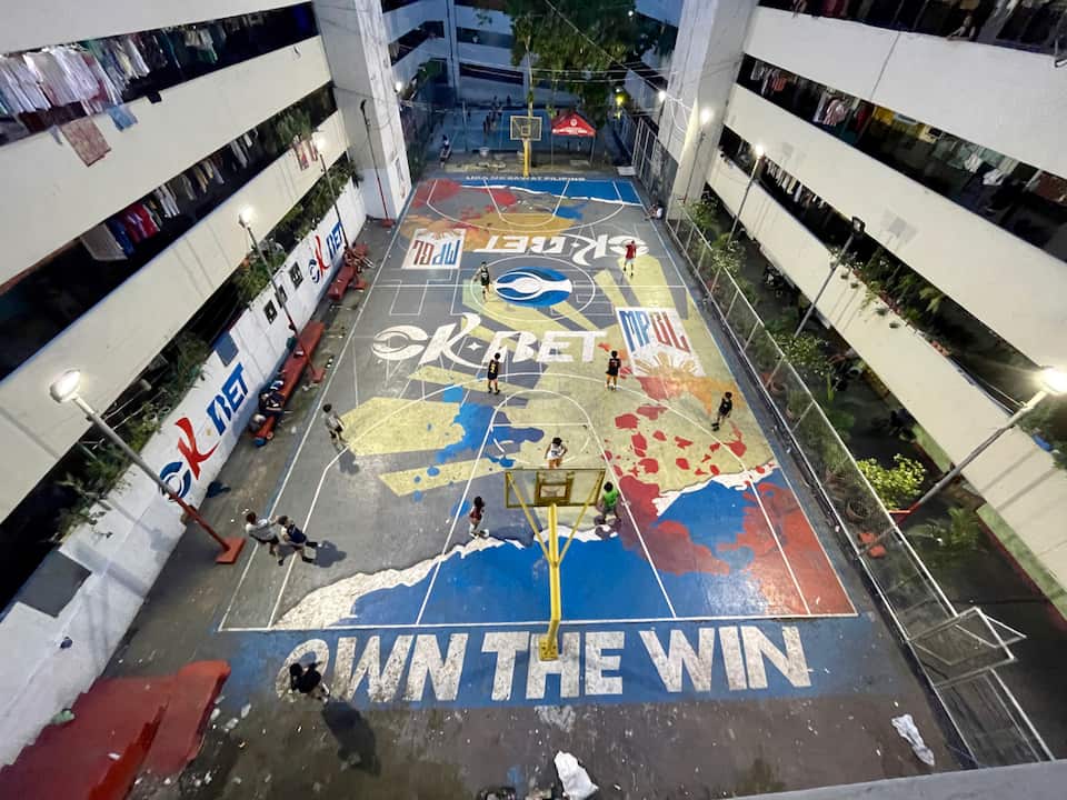 The people fighting to live on the most famous basketball court in Asia ...