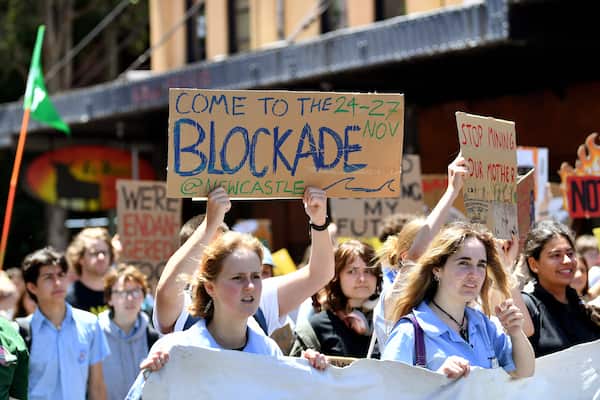 Students in Australia skip school to rally over climate 'shame' | SBS News