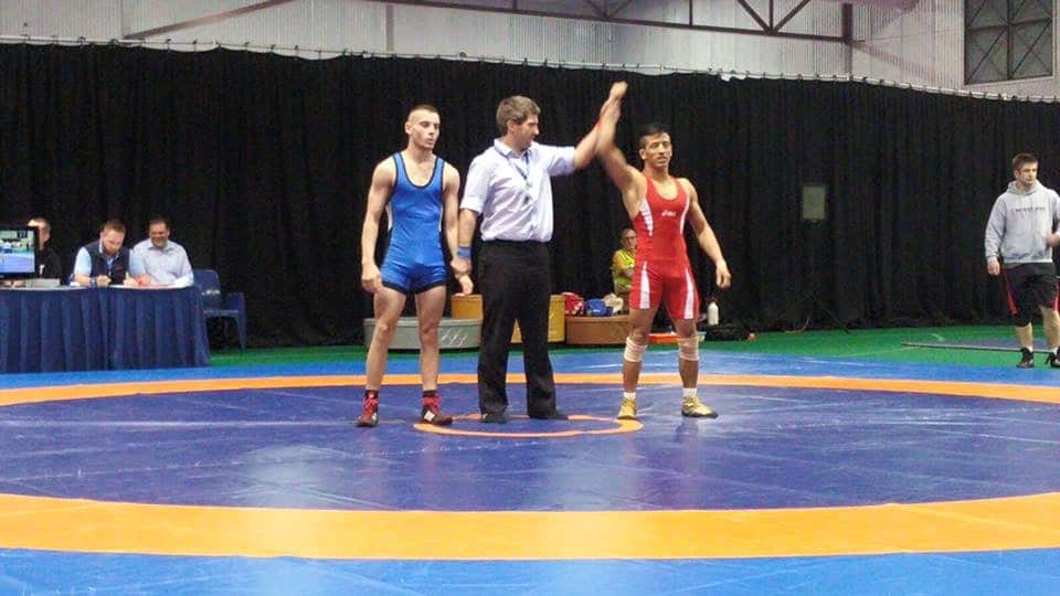 Ali Asghar Hussaini: Top wrestler finally gets Australian visa | SBS News