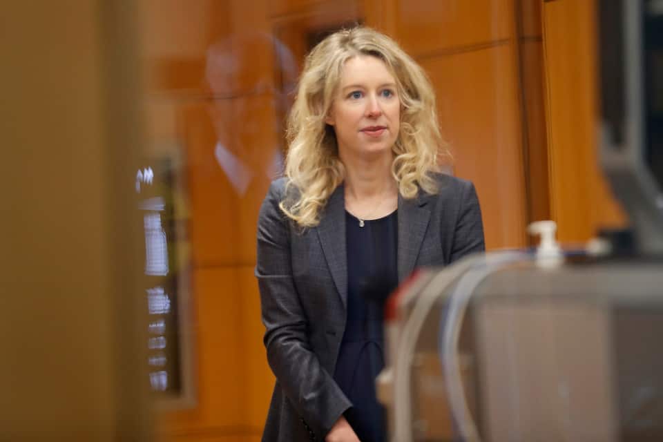 Theranos founder Elizabeth Holmes sentenced to jail for falsely ...