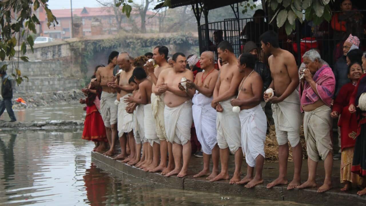 nepali bathing river