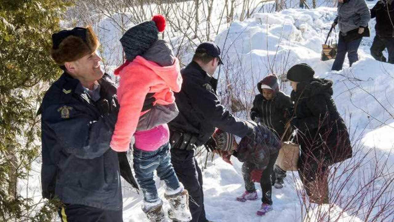 border guards holding hands