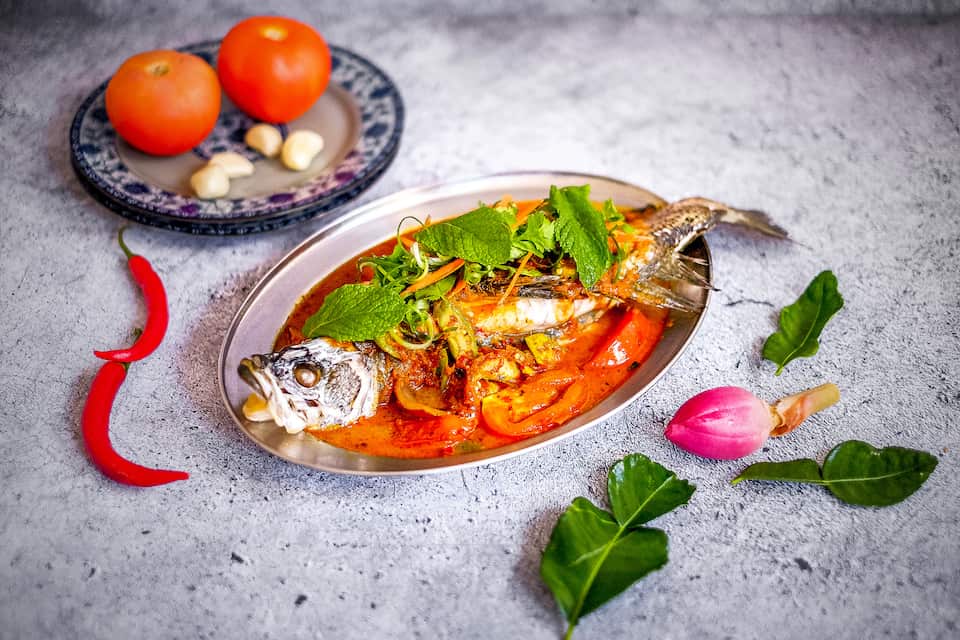 Feels like home: Junda Khoo makes his Amah’s fish curry | SBS Food