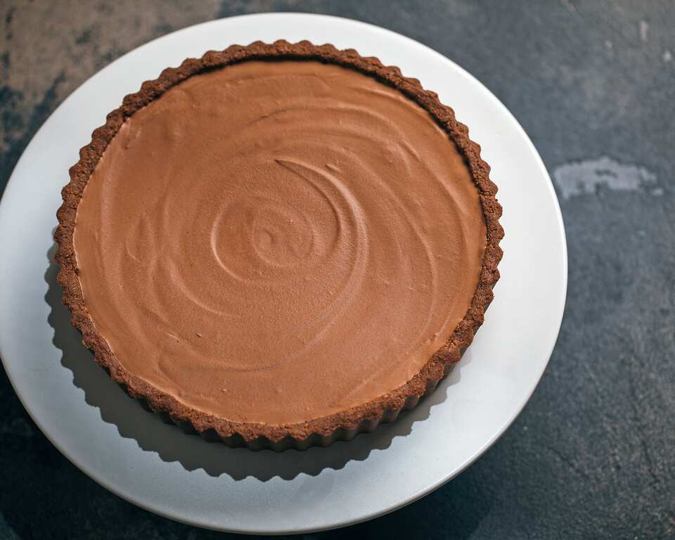 Hot, cold, vegan, or fluffy, there's a chocolate tart recipe for every ...