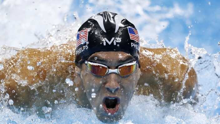 Ten-year-old named Clark Kent breaks swimmer Michael Phelps' record ...