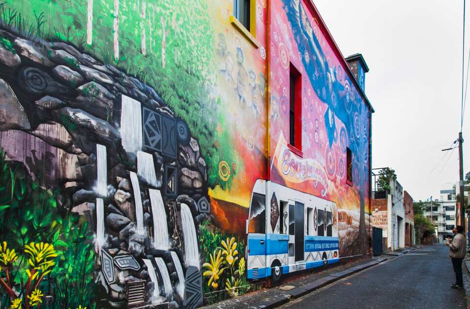 Aboriginal artist splashes history, culture and spirit on the streets ...