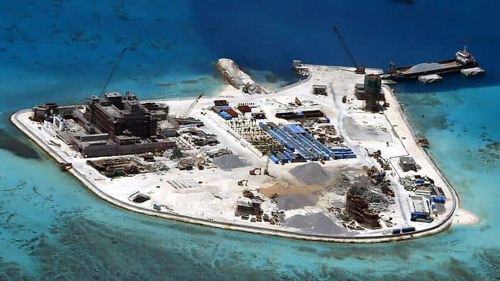 China 'sends missiles' to contested island | SBS Chinese